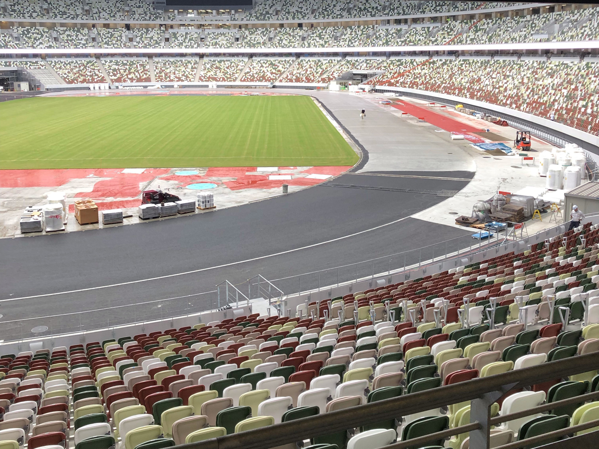 Installation of the Main Track at the Olympic Stadium in Tokyo ...